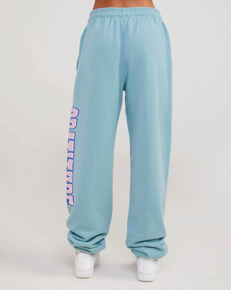 teal sweatpants with gratitude graphic